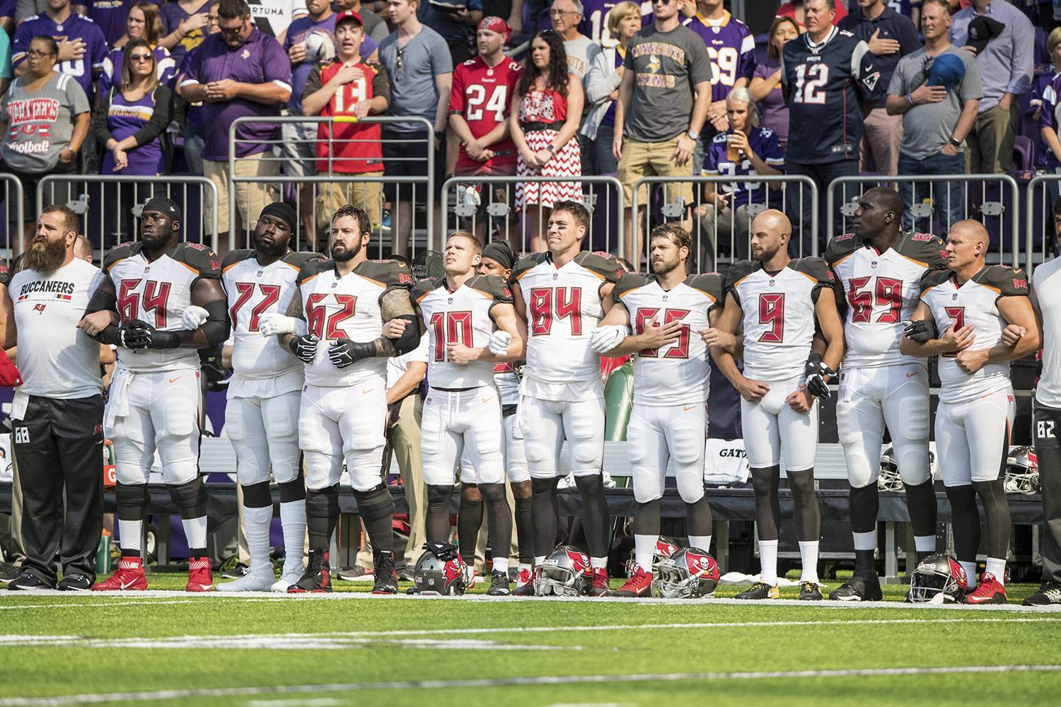 NFL players kneel or lock arms in unity during national anthem - The ...