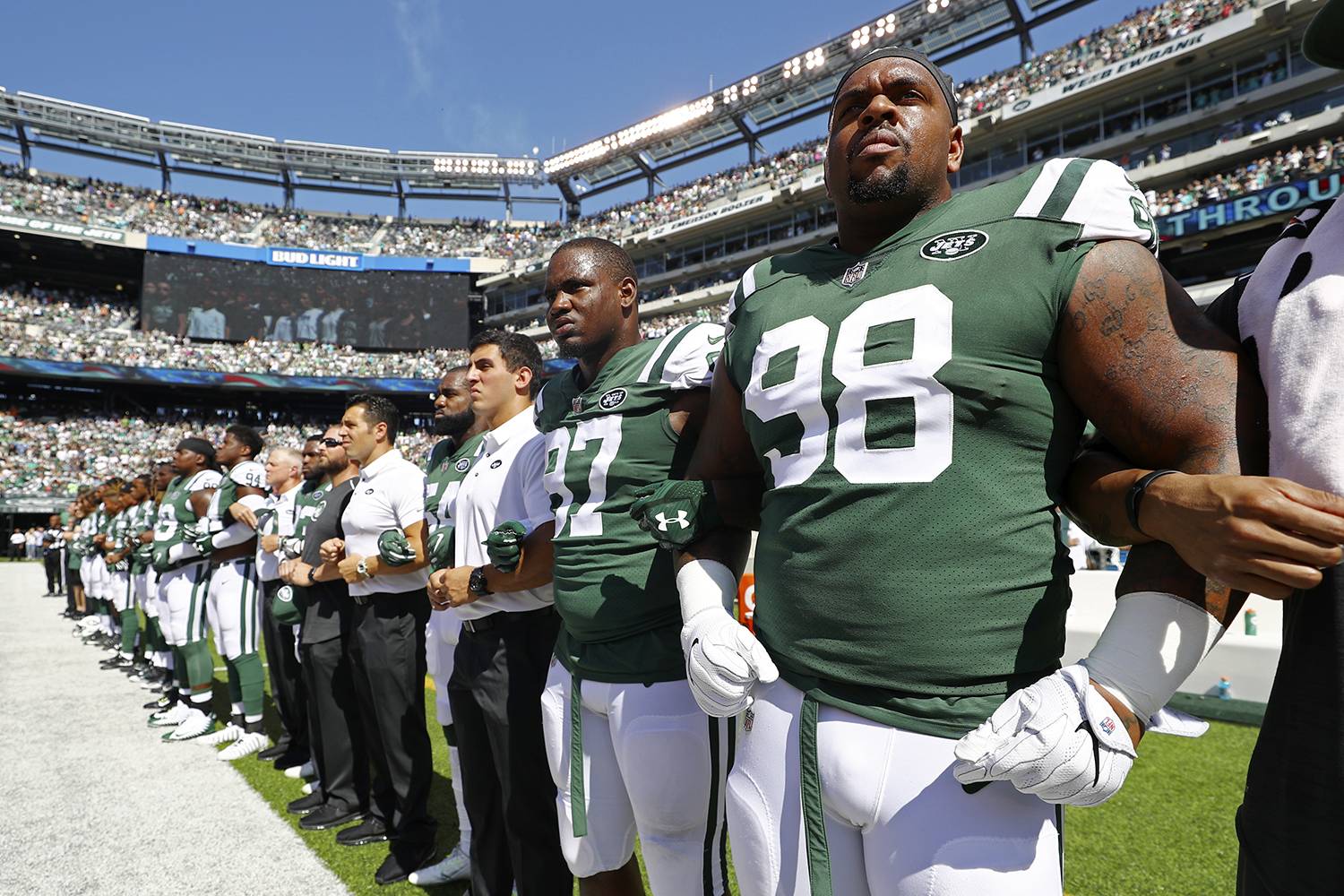 NFL players kneel or lock arms in unity during national anthem - The ...