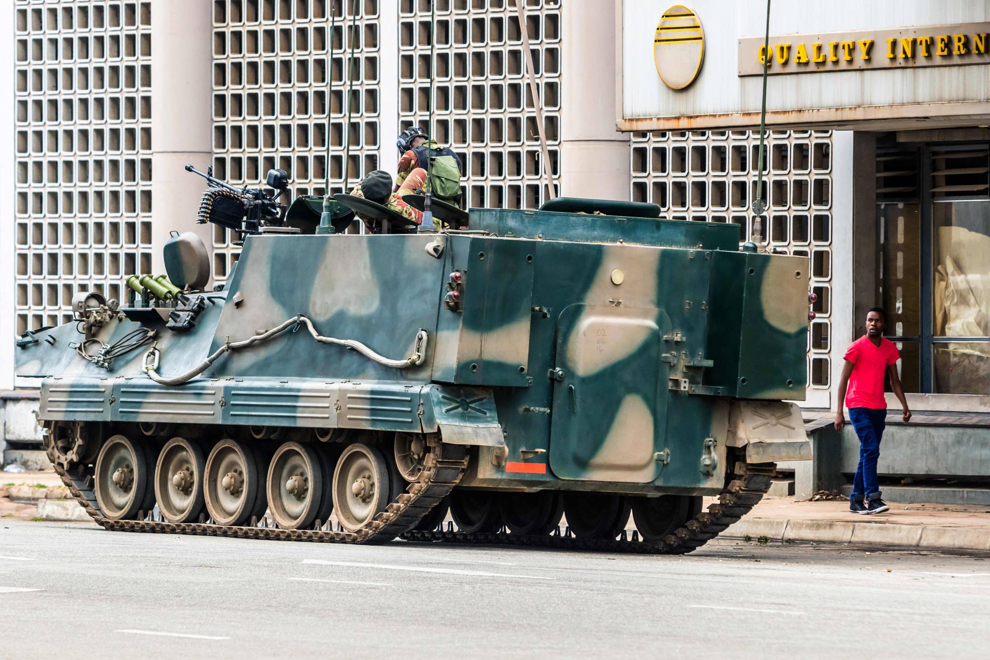 In photos: With Mugabe in custody Zimbabweans enter a new era - The ...